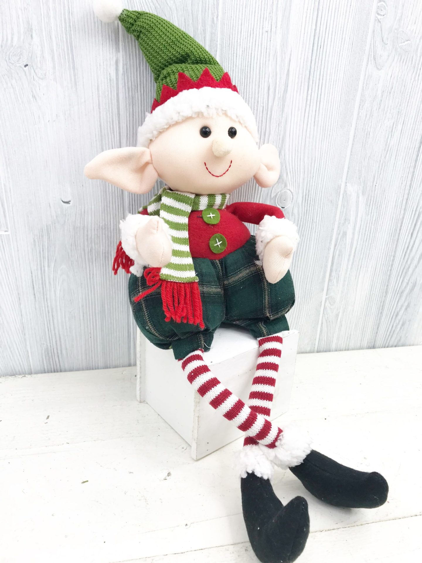 Red Plush Elf Sitter with hanging feet - Kelea's Florals